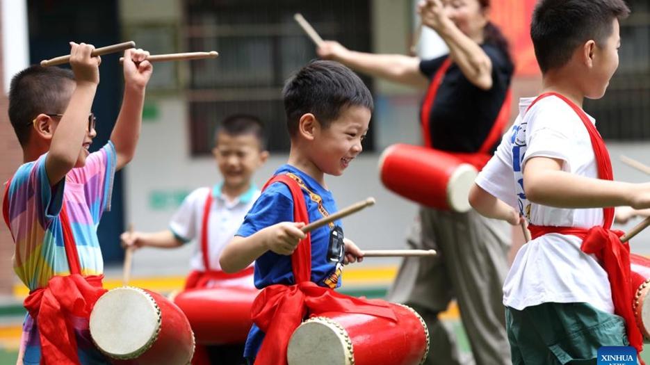 Children attend colorful cultural activities during summer vacation ...