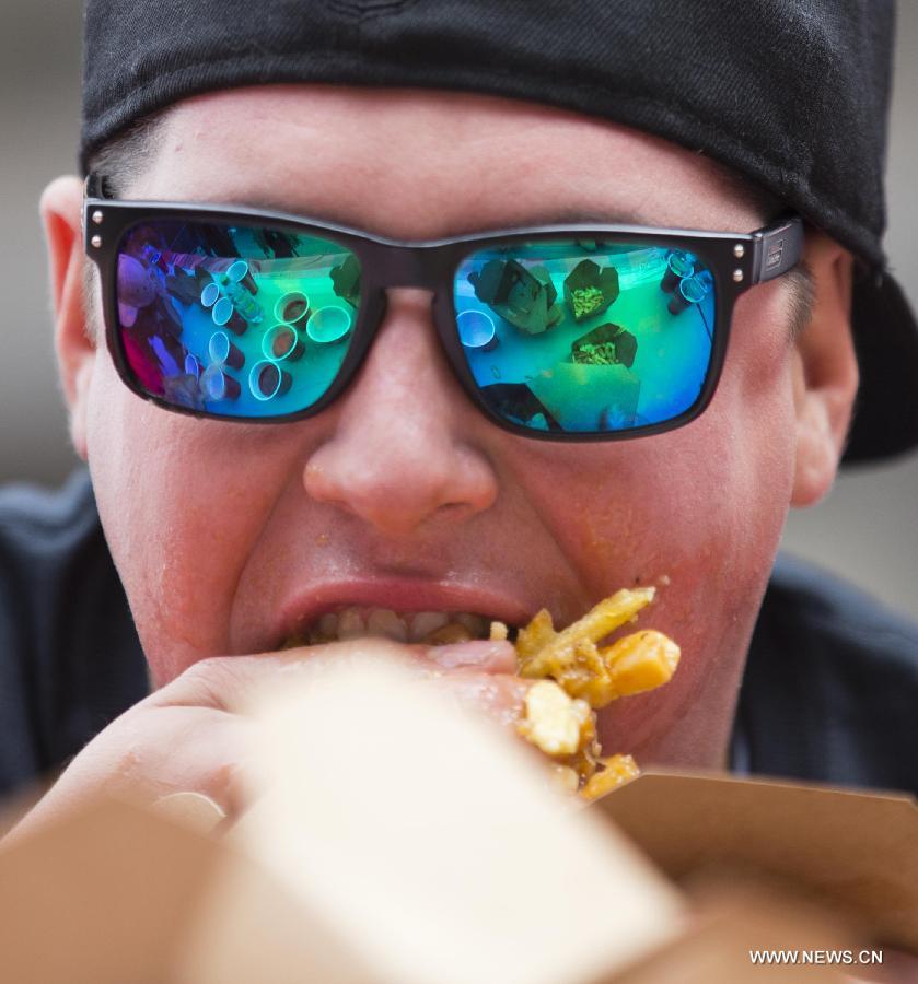 Kultur - german.china.org.cn - Poutine-Wettessen in Toronto