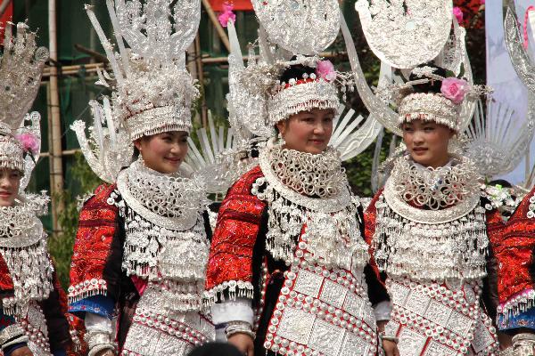 Miao ethnic girls dress up at festival - China.org.cn