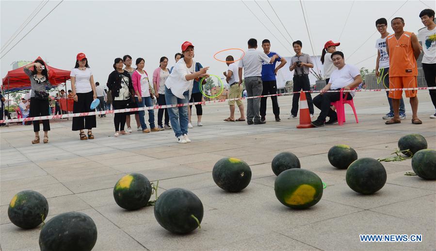 Watermelon eating competition attracts visitors, participants- China.org.cn