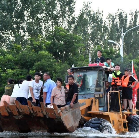 Avanzan labores de rescate en la inundada Weihui, Henan de China ...