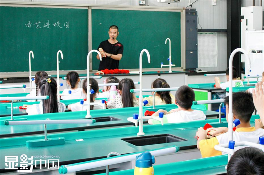 Un heredero del Kuaiban chino difunde el arte entre la comunidad ...