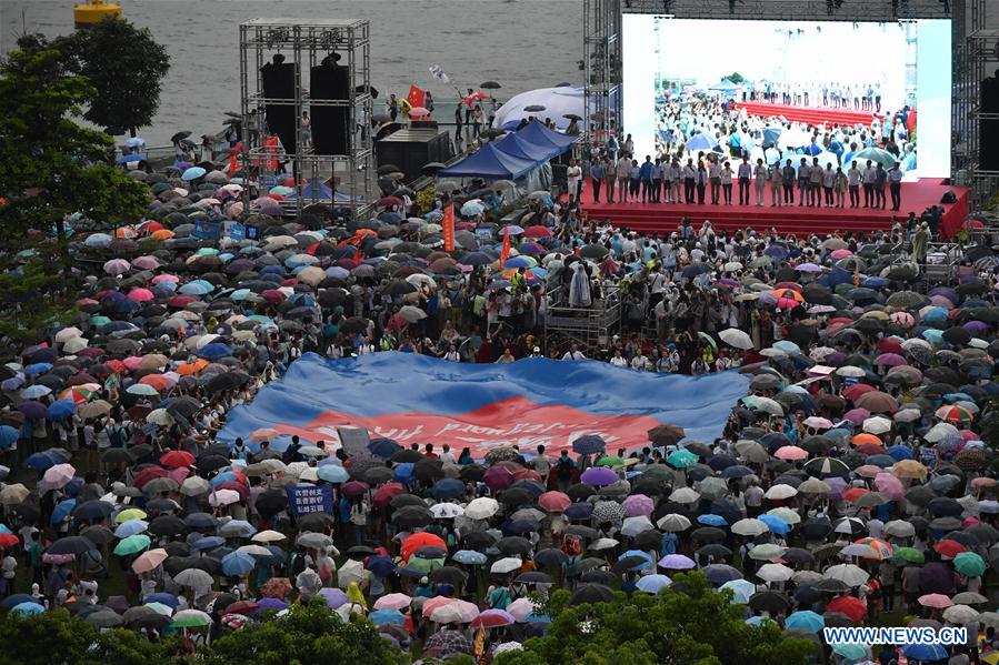 Residents of China's Hong Kong rally to appeal for peace, stability ...