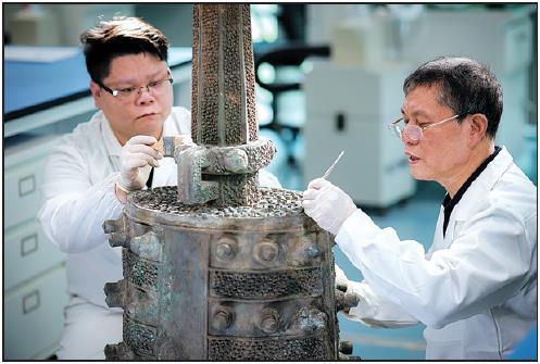 Father and son save national treasures in age of restoration - China.org.cn