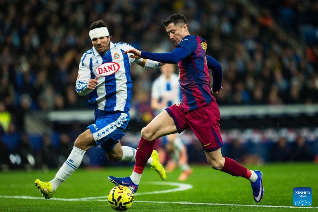 Late Olmo and Lewandowski goals give Barca 2-0 win at Espanyol - China ...