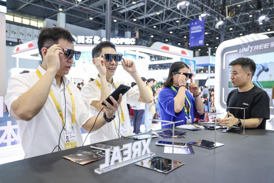 China sees consumption recovery, robust growth in emerging industries ...